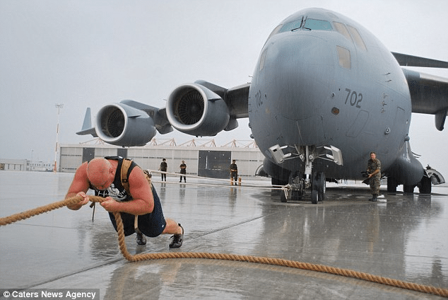 Meme Generator - Strong man pulling airplane - Newfa Stuff